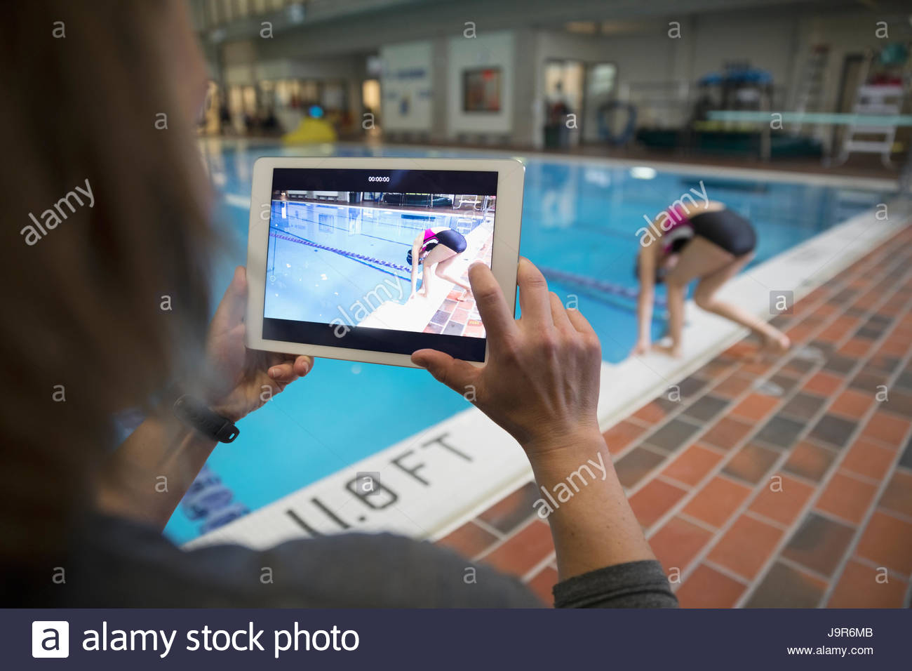 Family using swimming pool hi-res stock photography and images - Alamy