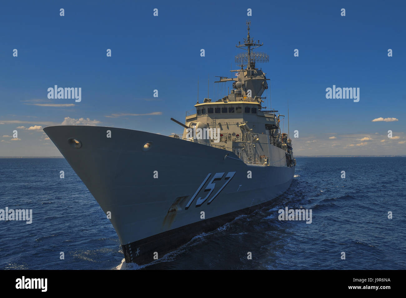 A three-quater head-on view of the Australian navy frigate, HMAS Perth ...
