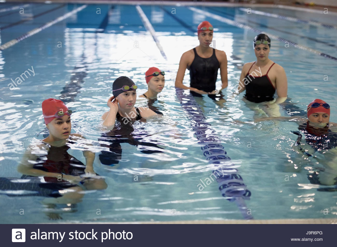 Female swimmer standing pool hi-res stock photography and images - Alamy