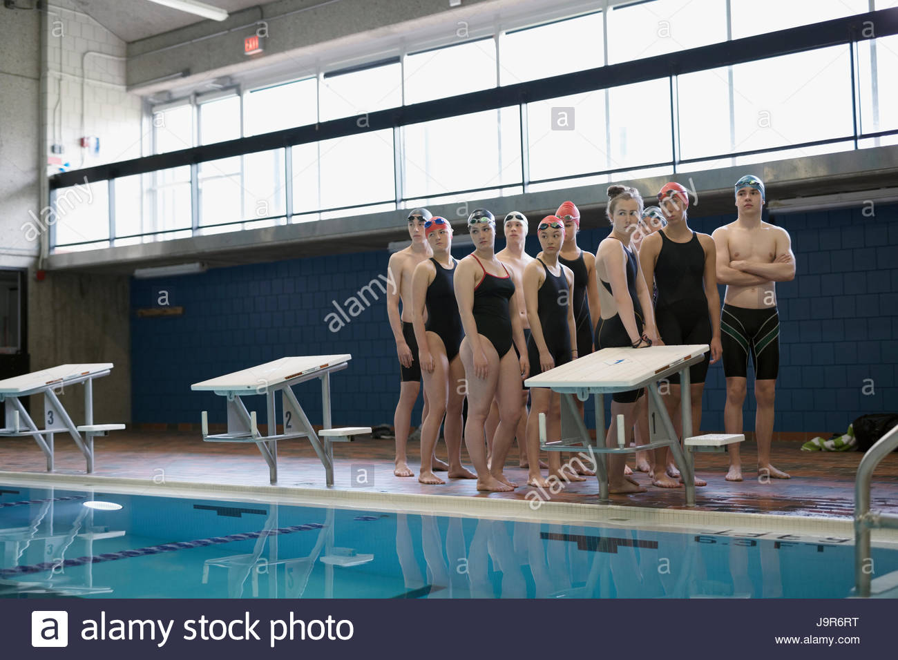 Woman standing swimming pool day hi-res stock photography and images ...