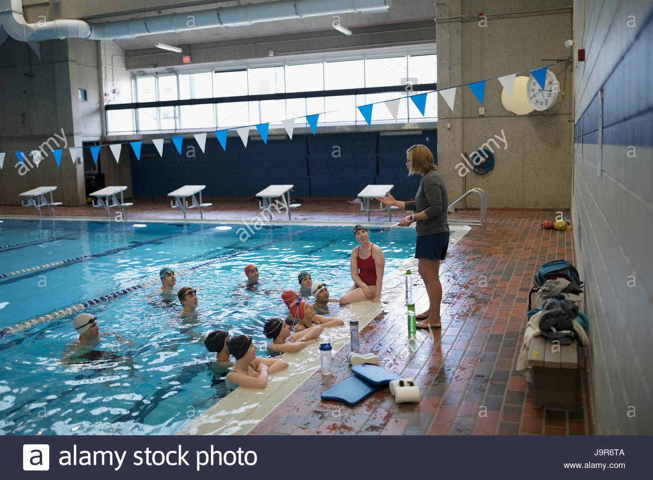 Female swimmer standing pool hi-res stock photography and images - Alamy