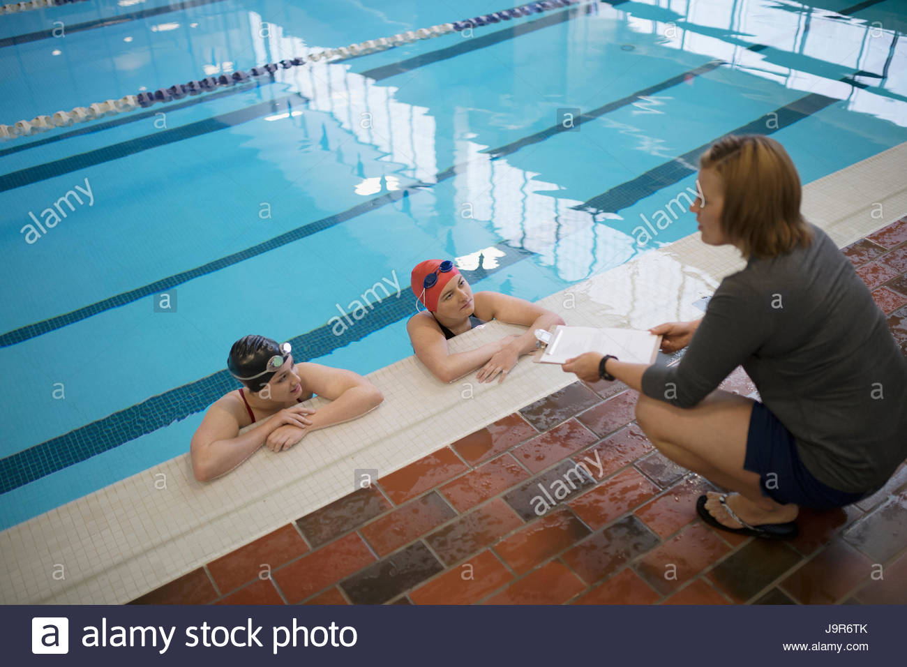 Holding edge of swimming pool hi-res stock photography and images - Alamy