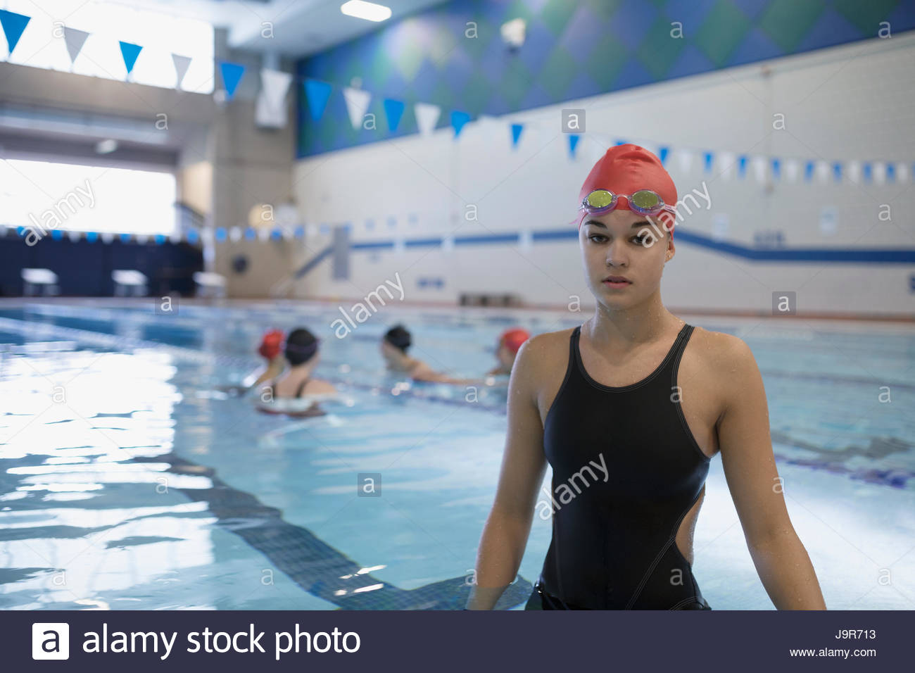 Swimmer standing swimming pool hi-res stock photography and images - Alamy