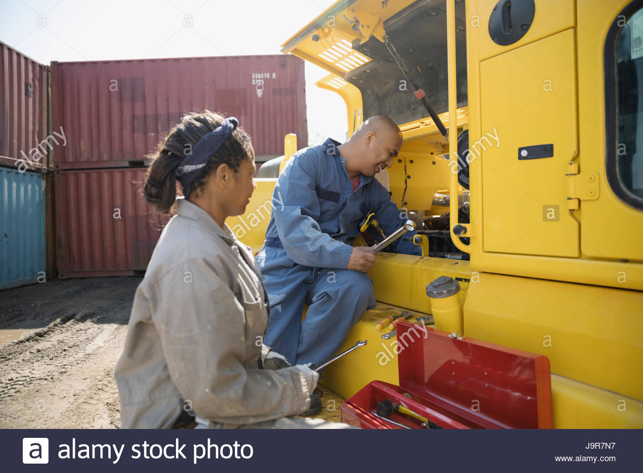 Woman using heavy machinery in hi-res stock photography and images - Alamy