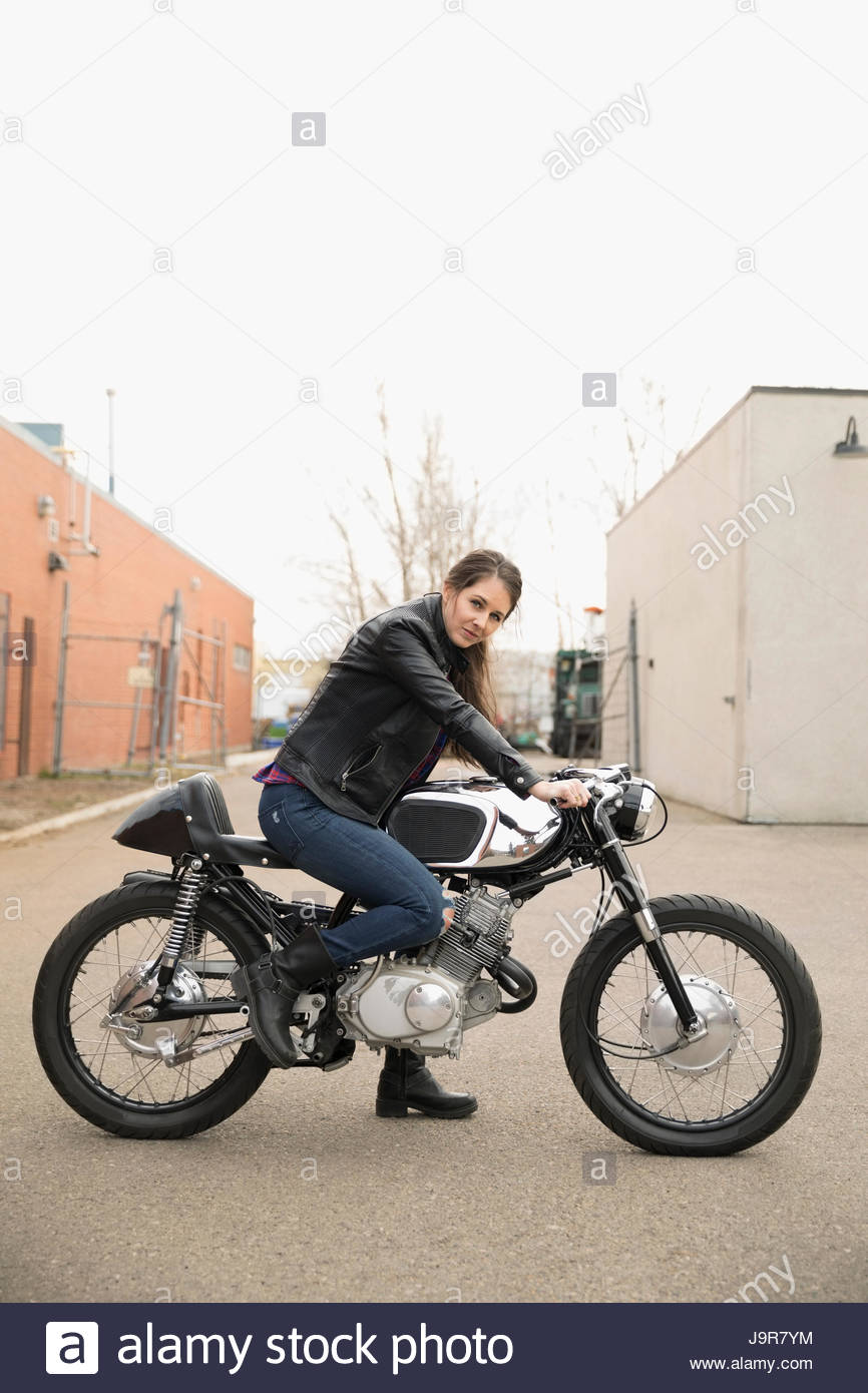 Woman riding motorcycle side view hi-res stock photography and images ...