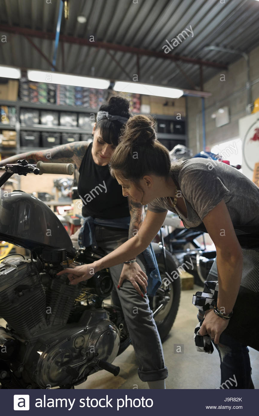 Female mechanic working on motorcycle hi-res stock photography and ...