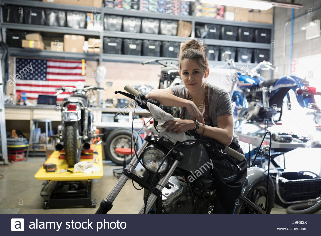 Female mechanic working on motorcycle hi-res stock photography and ...