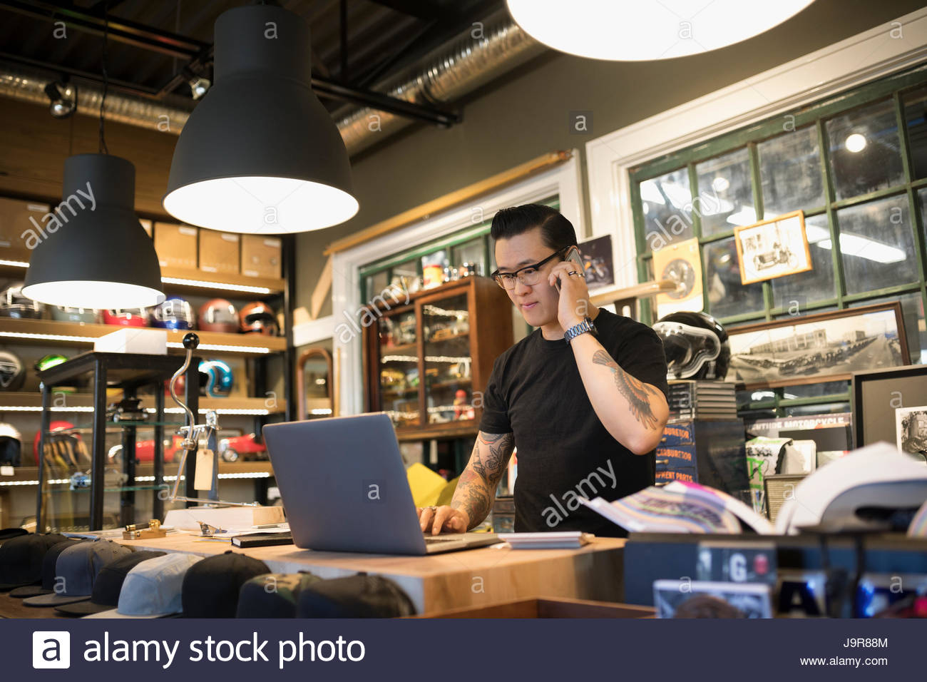 Man black hair on a motorcycle hi-res stock photography and images - Alamy