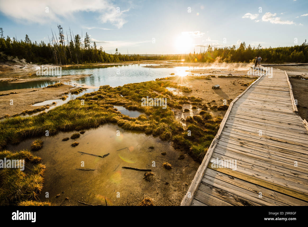 A boardwalk for visitors to explore the Norris geyser basin at ...