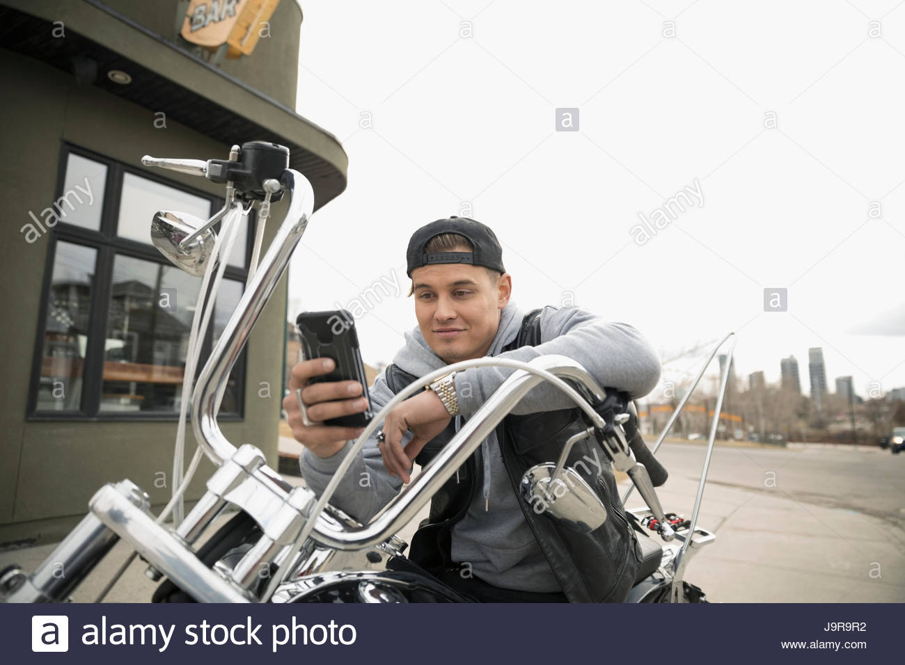 Man leaning on motorcycle hi-res stock photography and images - Alamy