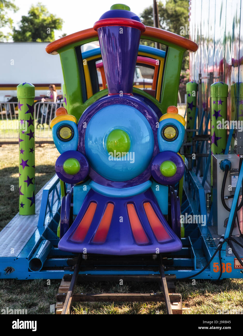 Child's ride of a train engine at the county fair Stock Photo - Alamy