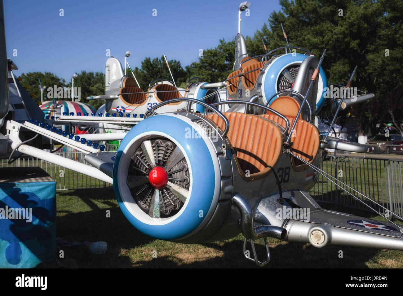 Flying airplane ride at the county fair Stock Photo - Alamy