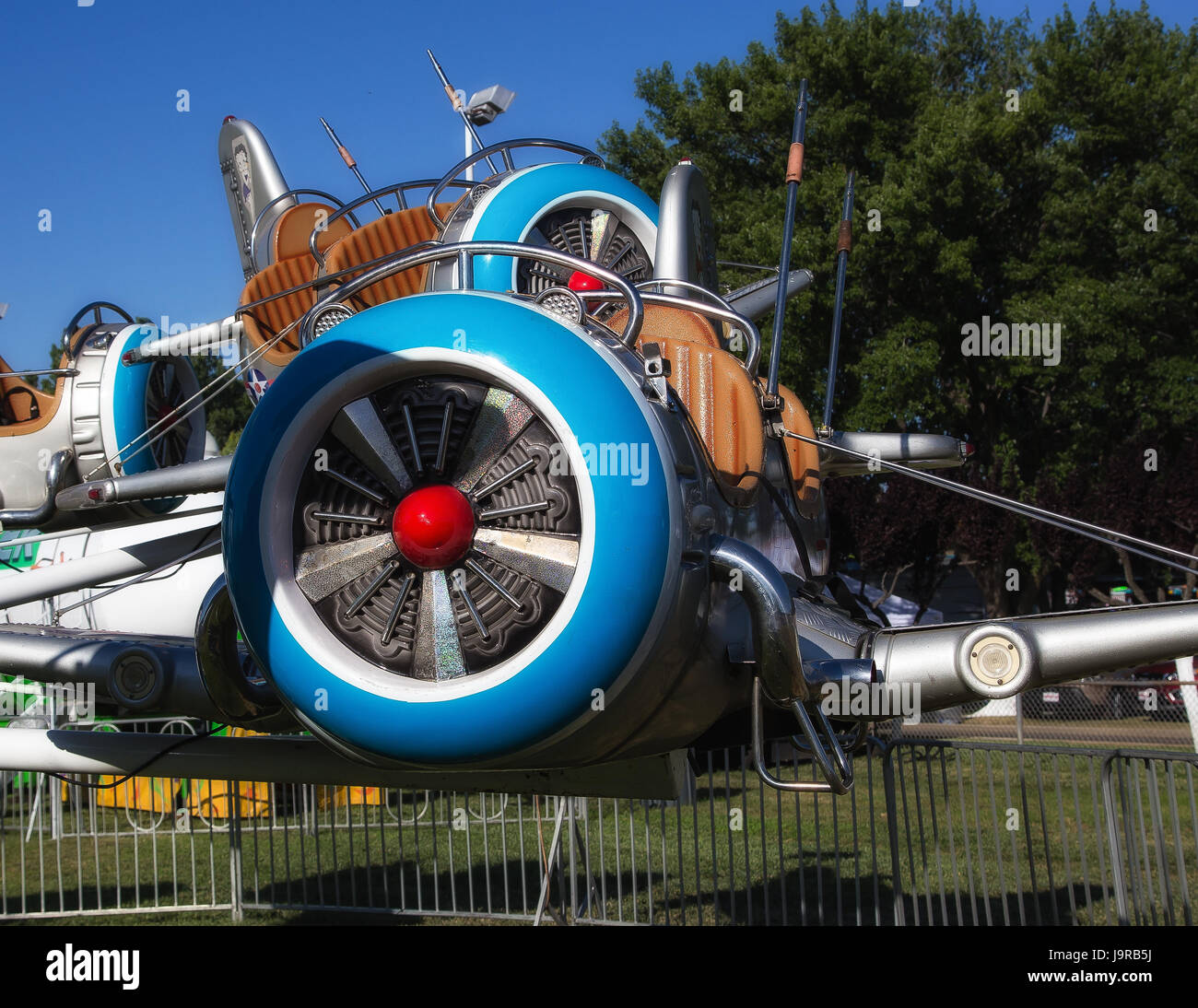 Flying airplane ride at the county fair Stock Photo - Alamy