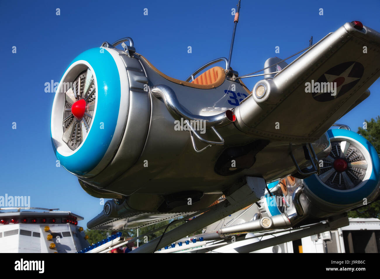 Flying airplane ride at the county fair Stock Photo - Alamy