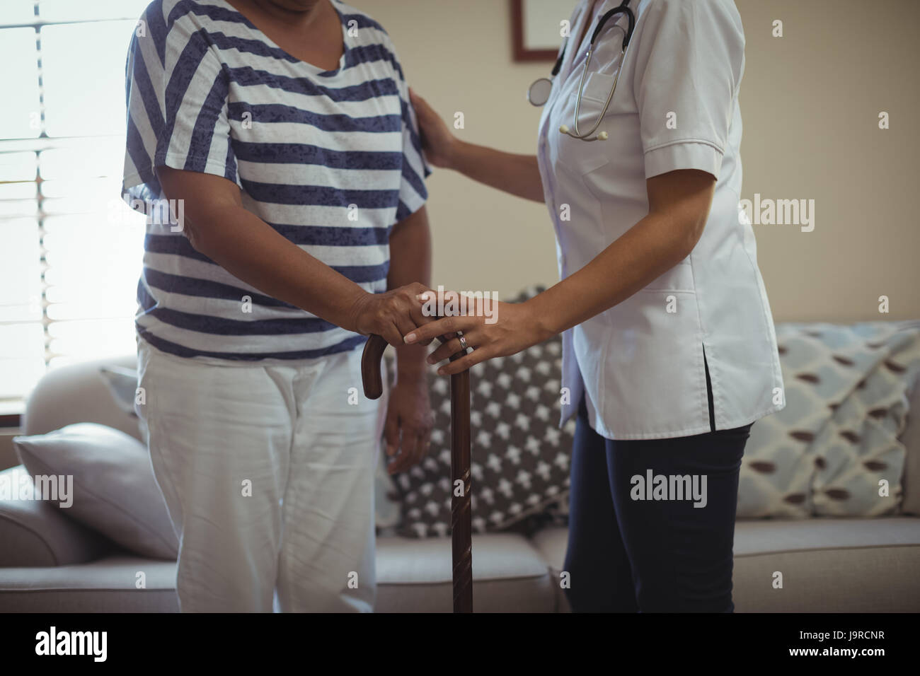 Helping stick hi-res stock photography and images - Alamy