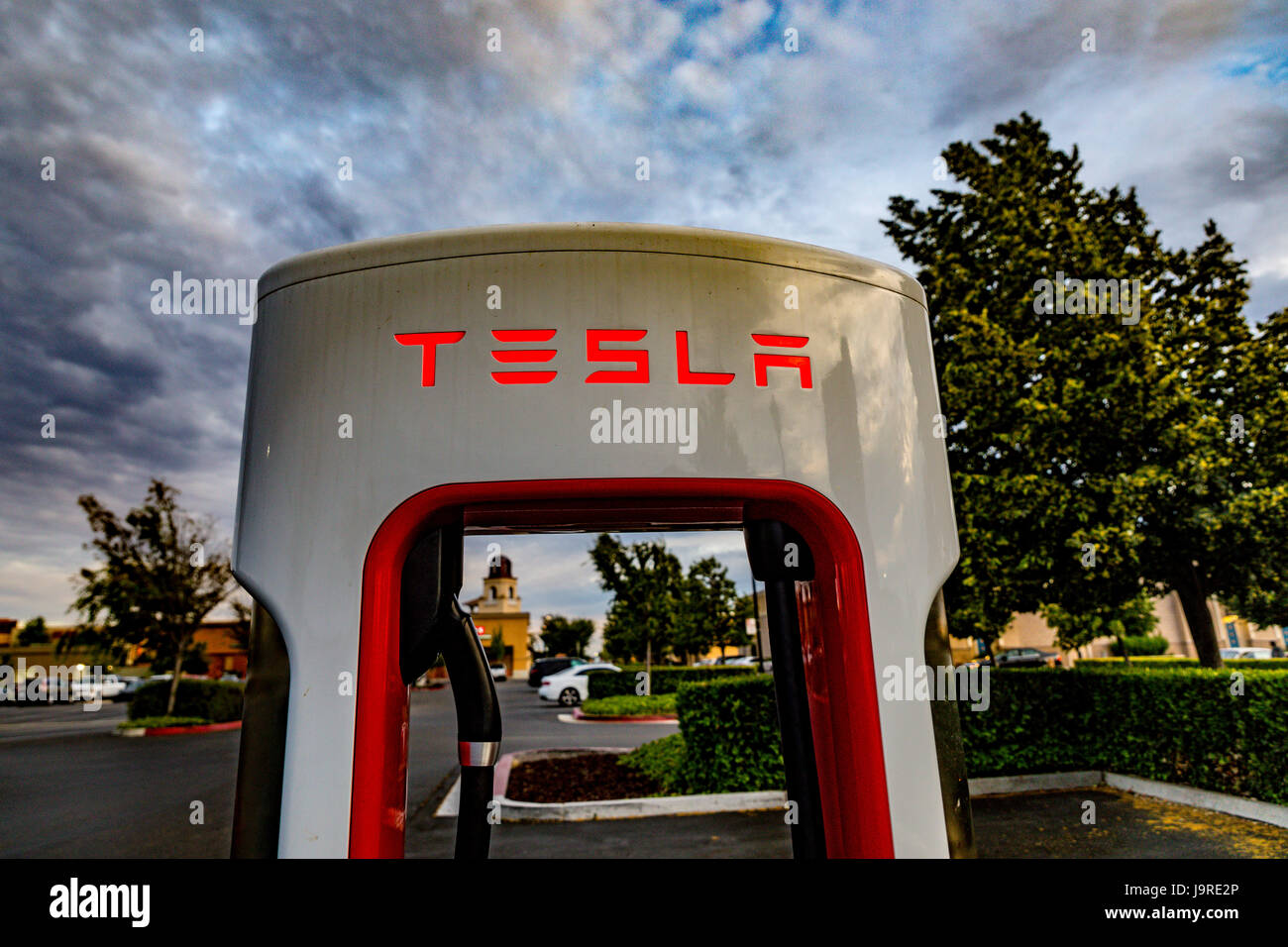 The Tesla logo at a supercharger station at a shopping mall in Manteca ...