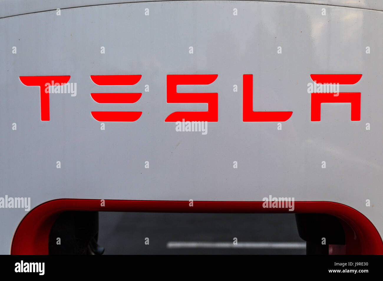 The Tesla logo at a supercharger station at a shopping mall in Manteca ...