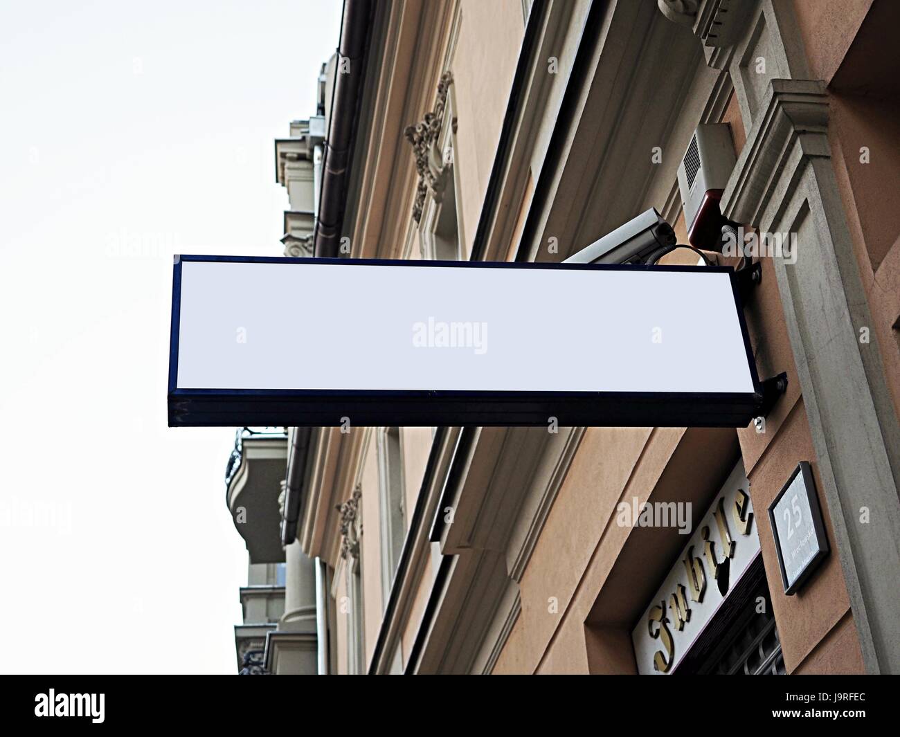 Signboard side view of empty white mock up signage in black, grey frame ...