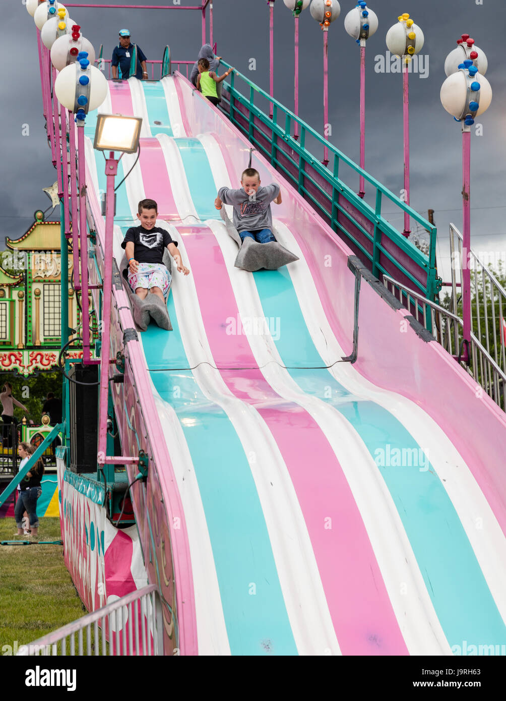Children on a giant slide at the Shasta County fair in Anderson ...