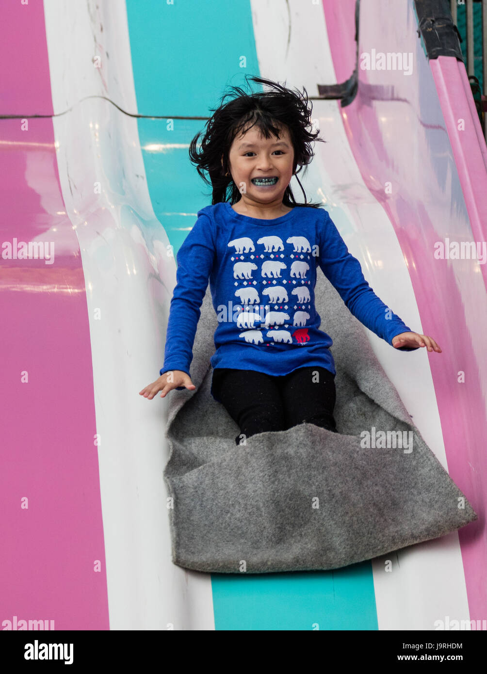 Children on a giant slide at the Shasta County fair in Anderson ...