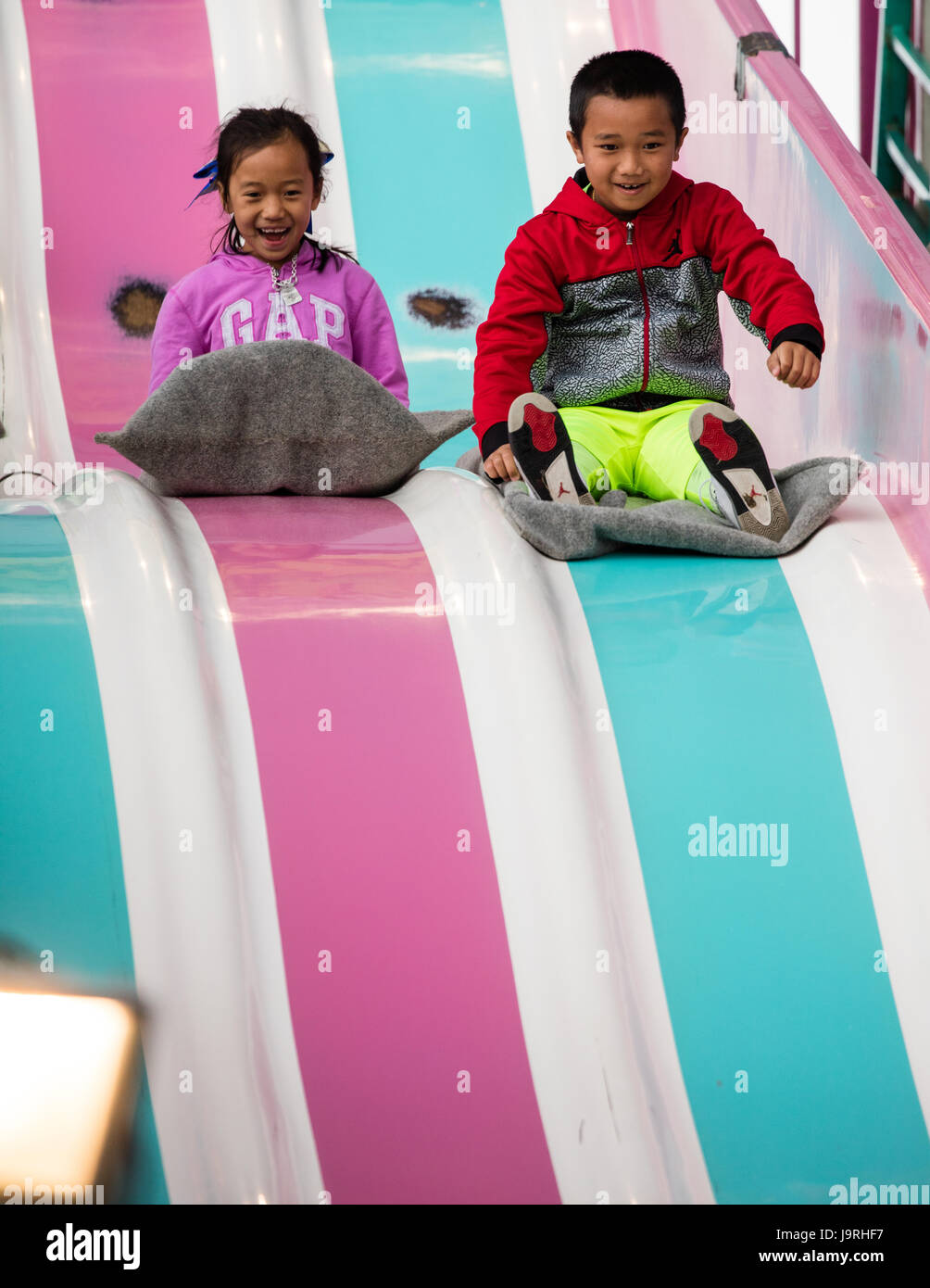 Children on a giant slide at the Shasta County fair in Anderson ...