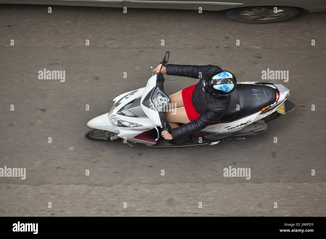Stylish woman on scooter, Old Quarter, Hanoi, Vietnam Stock Photo - Alamy