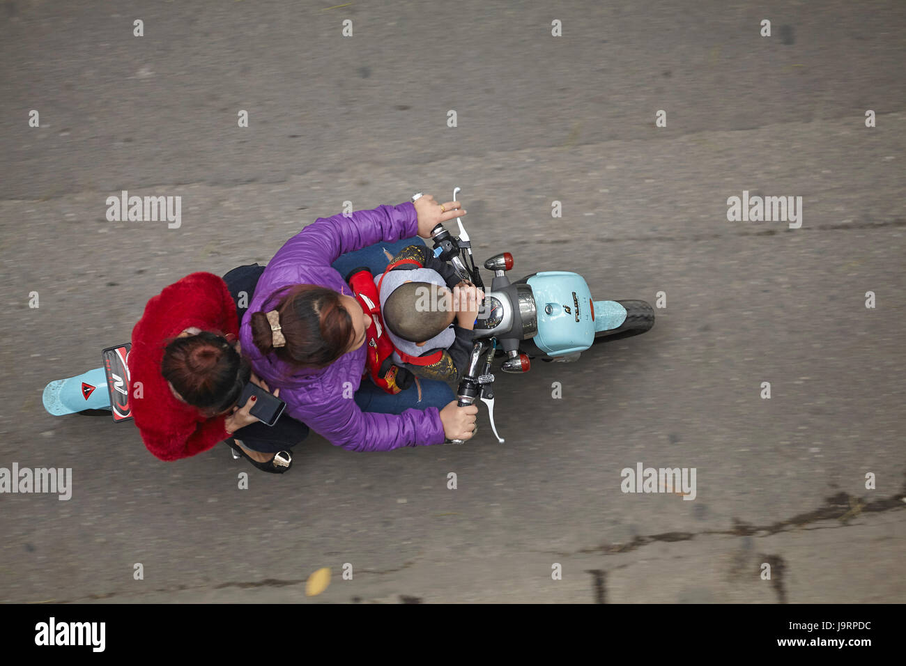 Family on a scooter, Old Quarter, Hanoi, Vietnam Stock Photo - Alamy