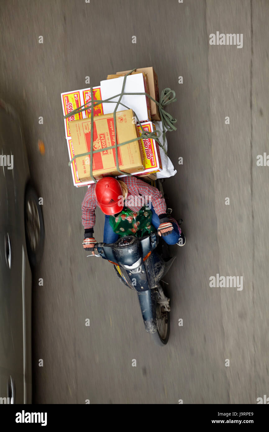 Heavily loaded scooter, Old Quarter, Hanoi, Vietnam Stock Photo - Alamy