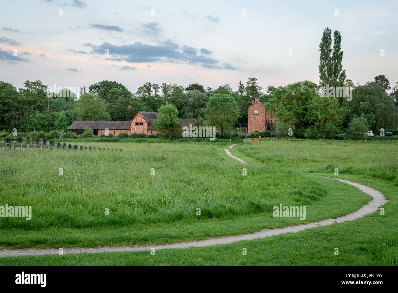 A view of Forge Mill Needle Museum across a field Stock Photo - Alamy