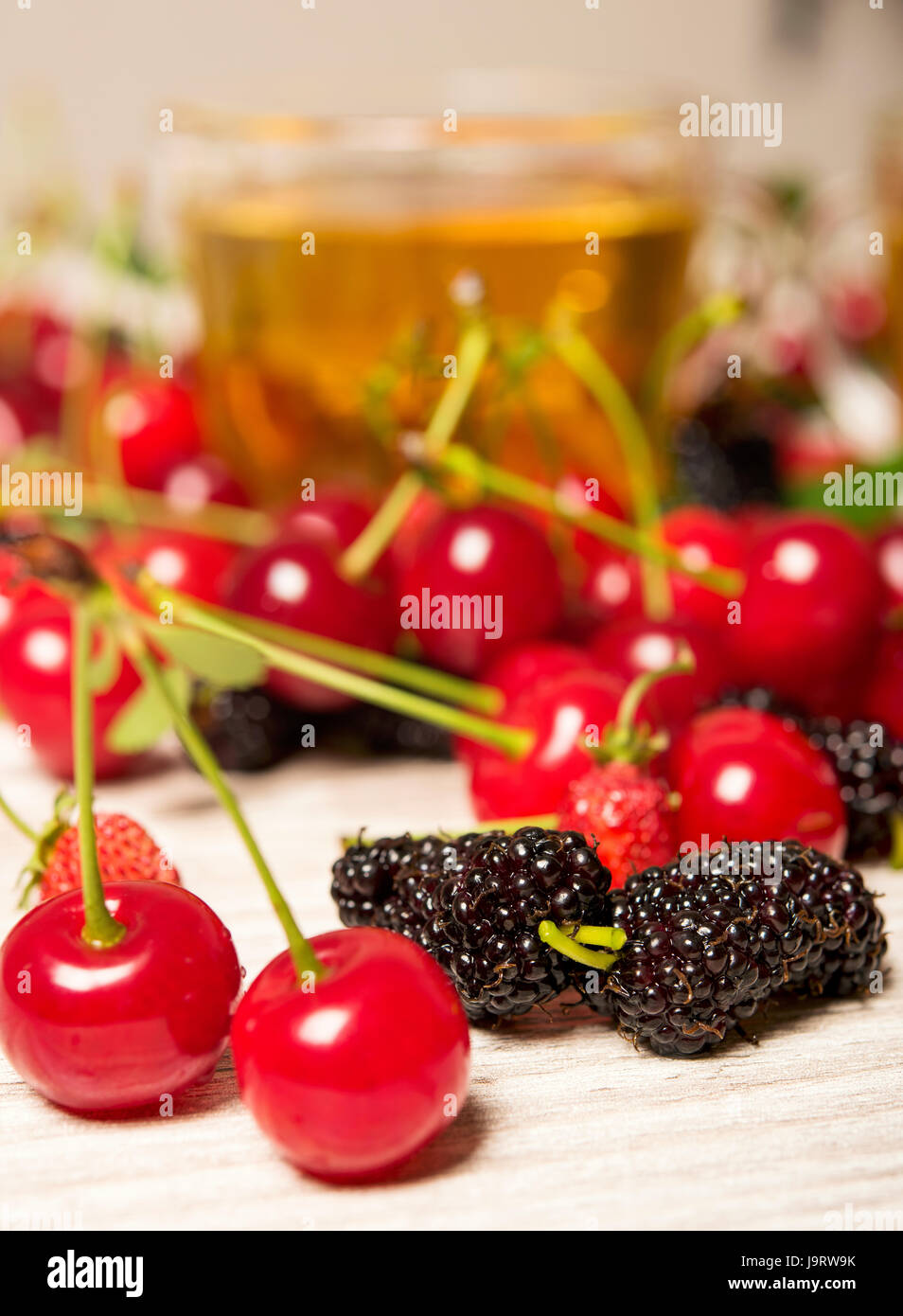 juicy fresh berries on a table Stock Photo - Alamy