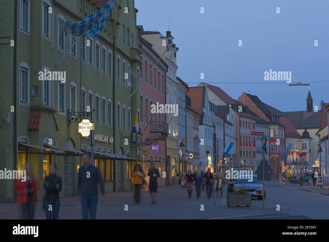 Germany,Bavaria,Freising,Old Town,lower high street,passer-by,evening ...
