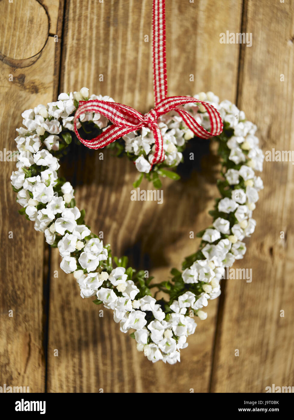 wooden wall,flower heart,square cord Stock Photo - Alamy