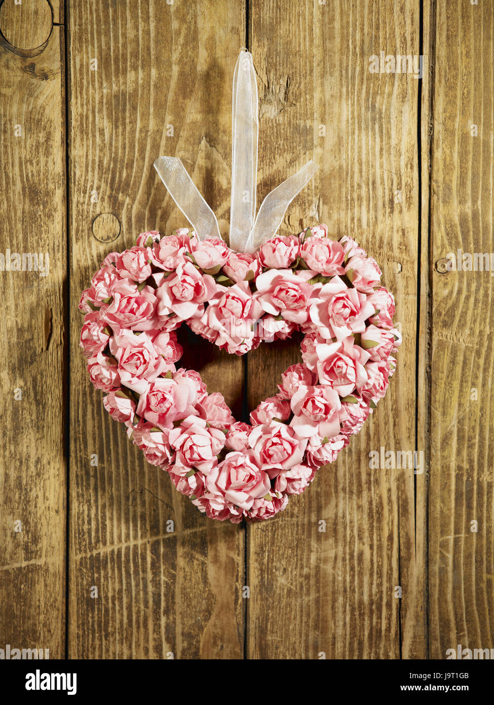 wooden wall,flower heart Stock Photo - Alamy