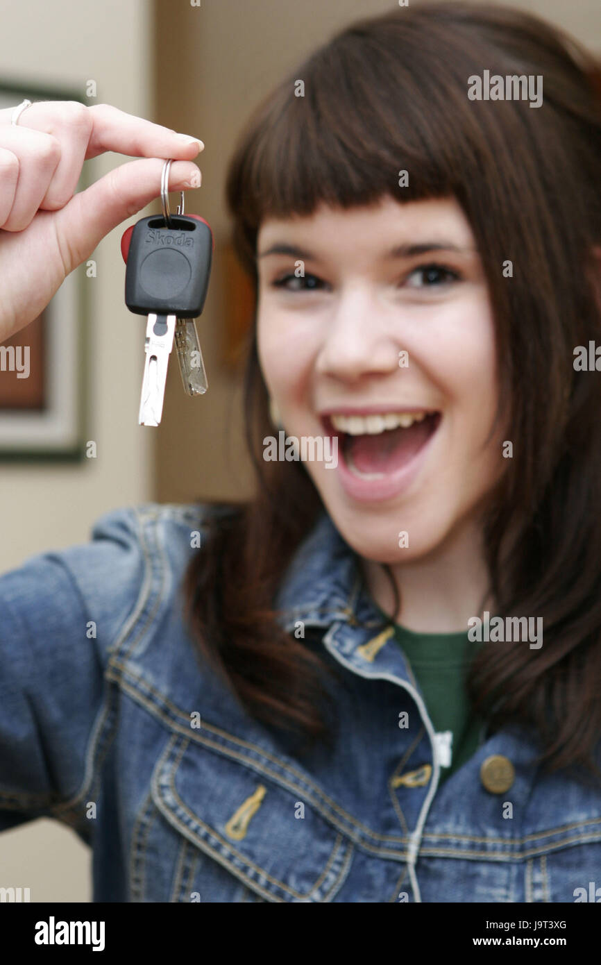 Woman with car key and driving licence driving test hi-res stock ...