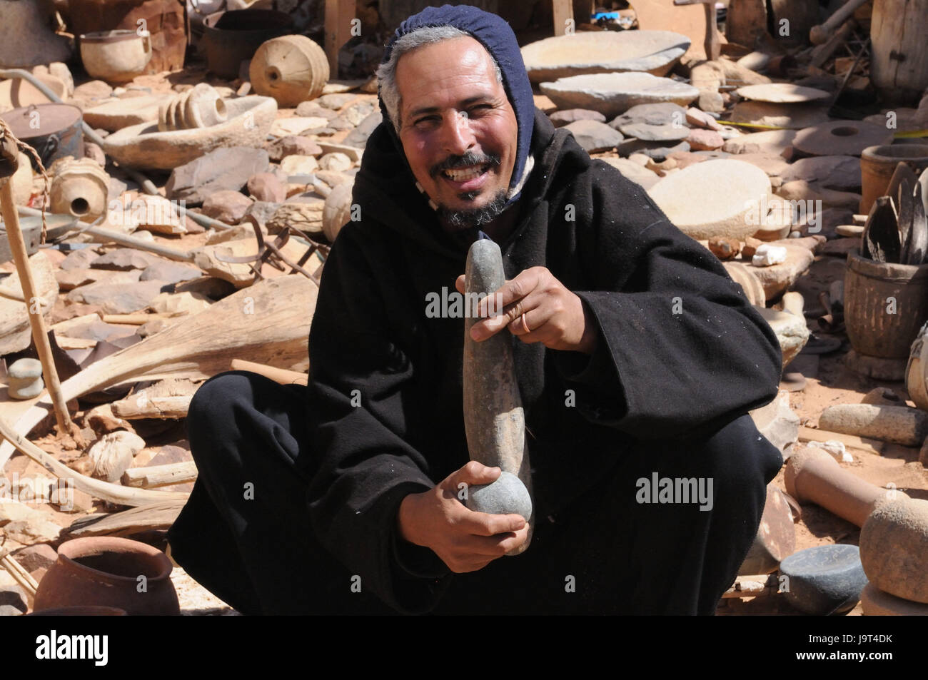 Mauritania,Adrar,Ouadane,man,happily,song stone,hold,no model release ...