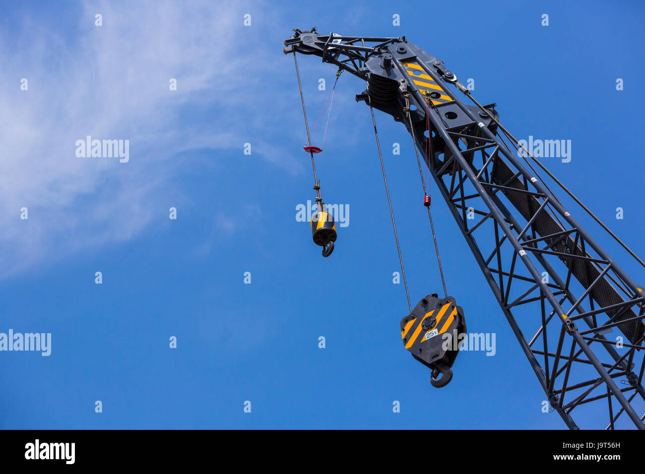 Mechanism of a crane with a hook for lifting loads Stock Photo - Alamy