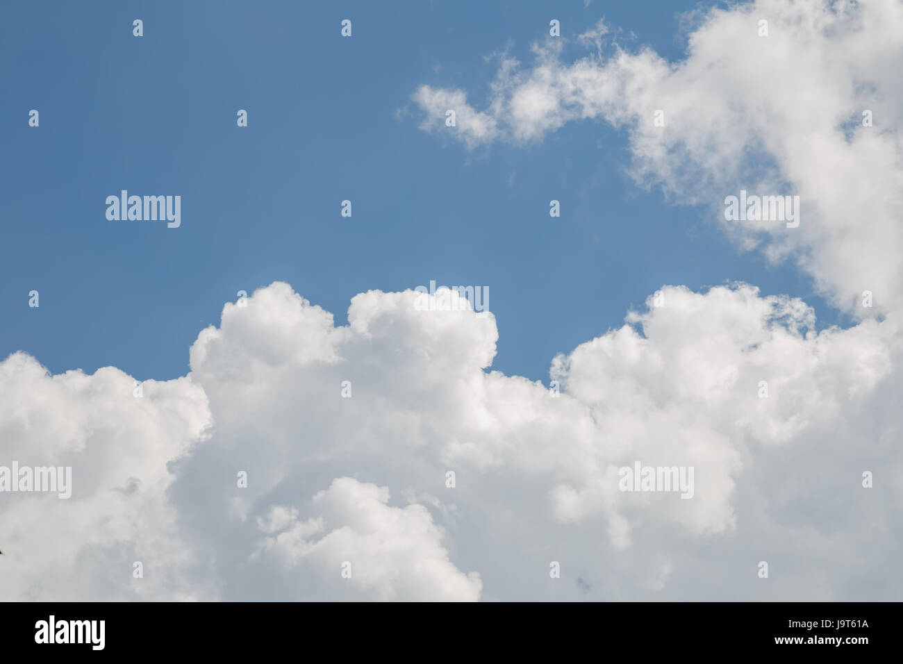 Looking up a cloudy sky Stock Photo - Alamy