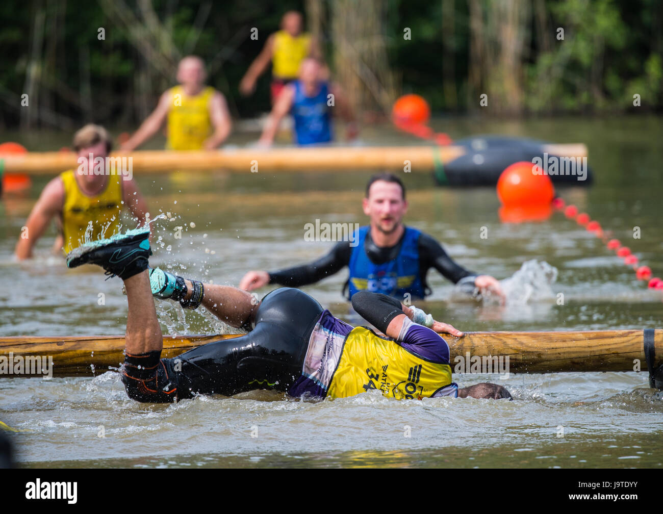 Waechtersbach, Germany. 3rd June, 2017. A participant jumps into a ...