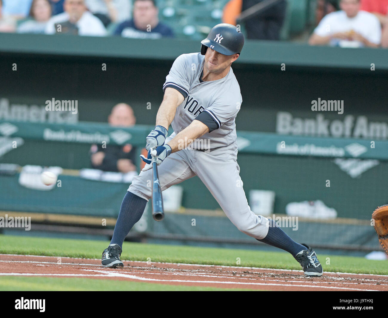 New York Yankees left fielder Brett Gardner (11) singles in the first ...