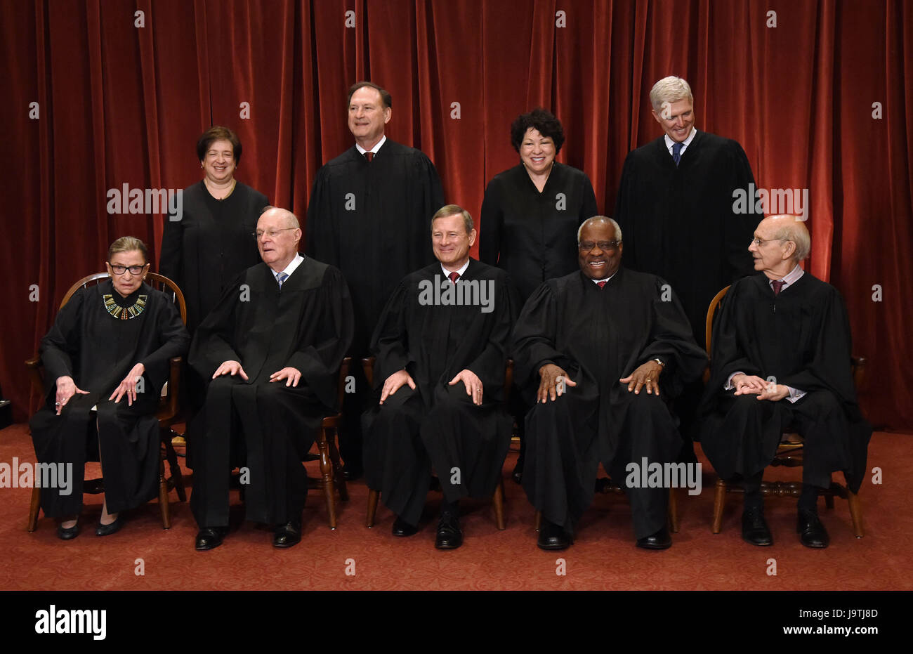 Members of the US Supreme Court pose for a group photograph at the ...