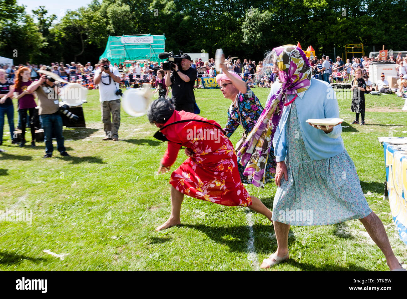 Two opposing teams throwing custard pies at each other during the World ...