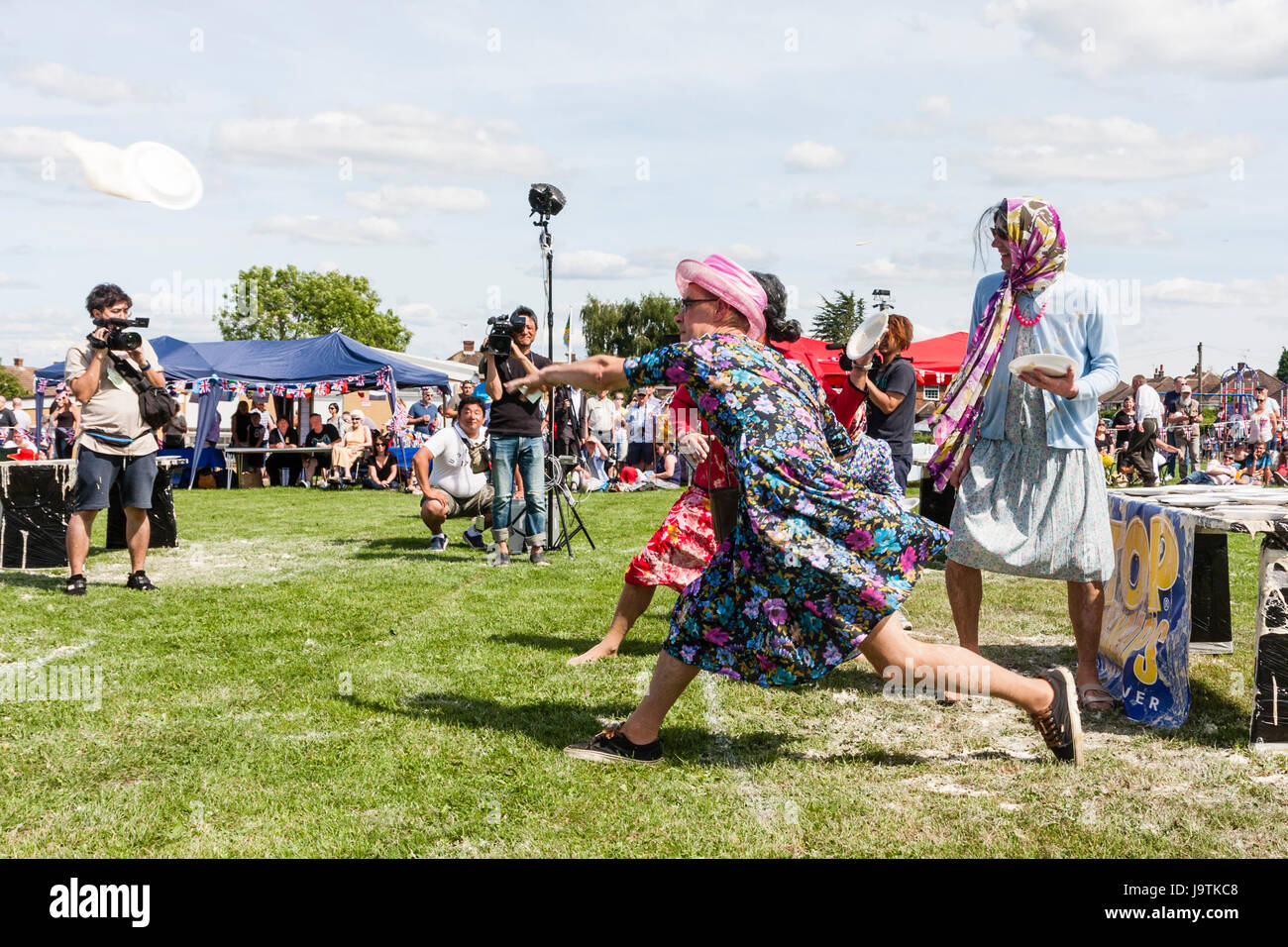 Two opposing teams throwing custard pies at each other during the World ...
