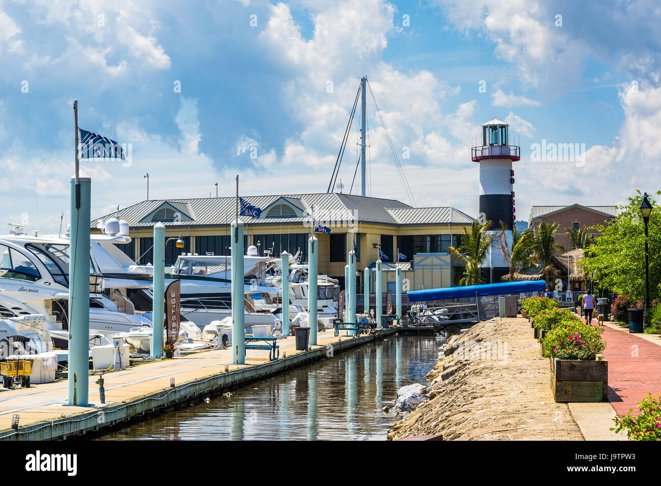 The Waterfront Promenade, a marina and lighthouse in Canton, Baltimore ...