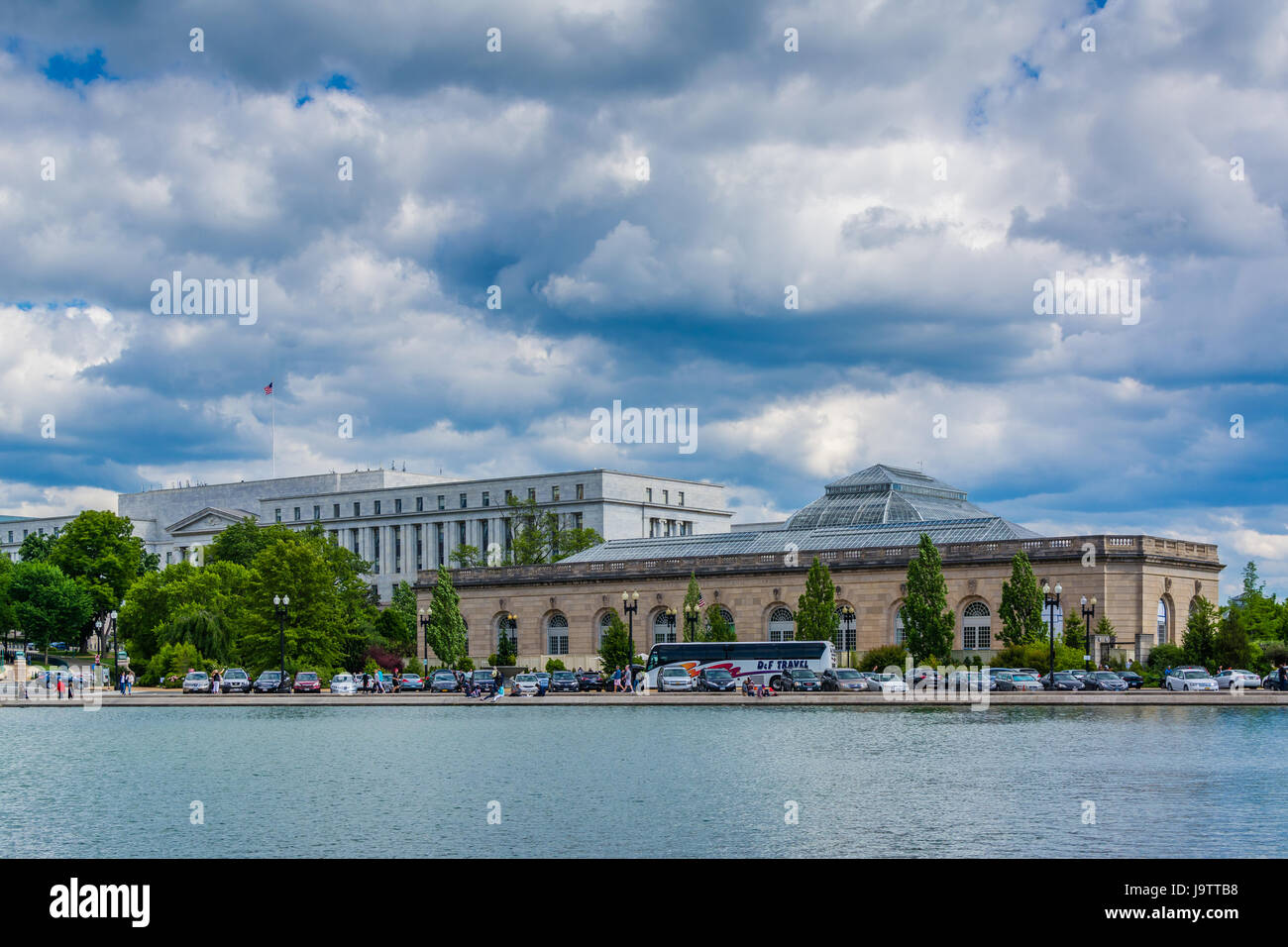 The Capitol reflecting pool and buildings in Washington, DC Stock Photo ...