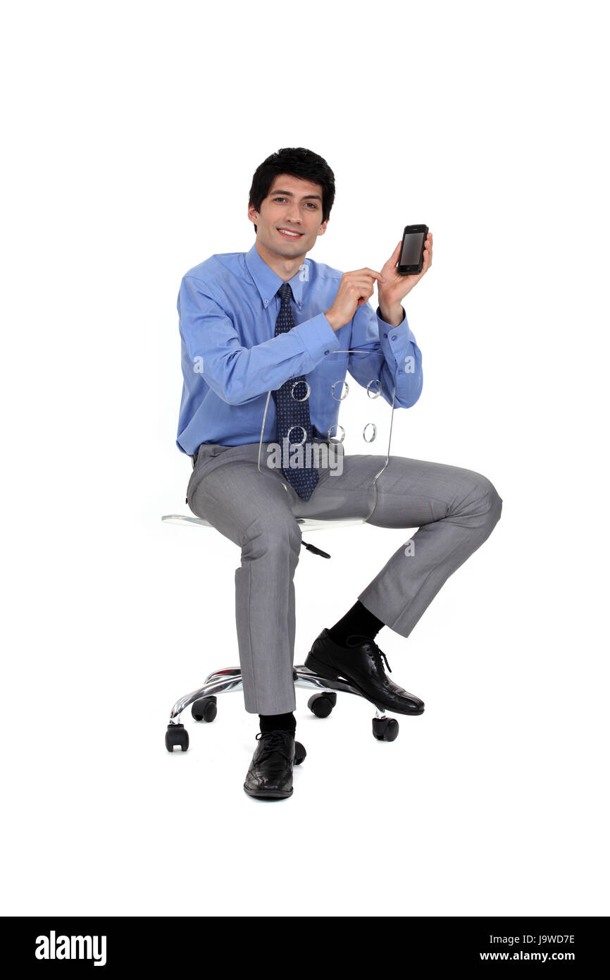 Man sitting on chair backwards hi-res stock photography and images - Alamy