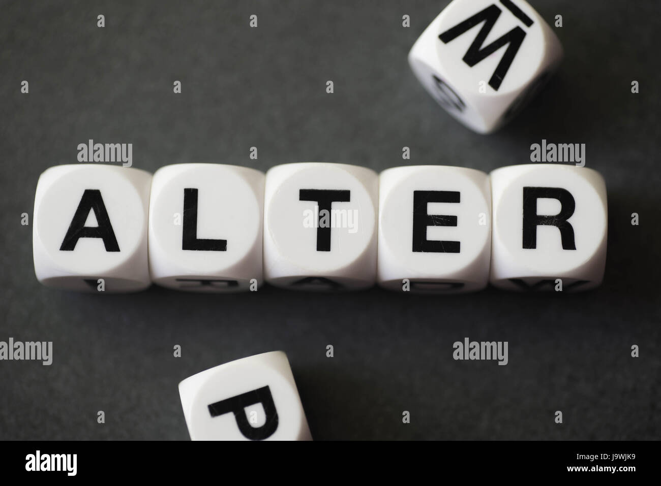 word alter on white toy cubes Stock Photo - Alamy