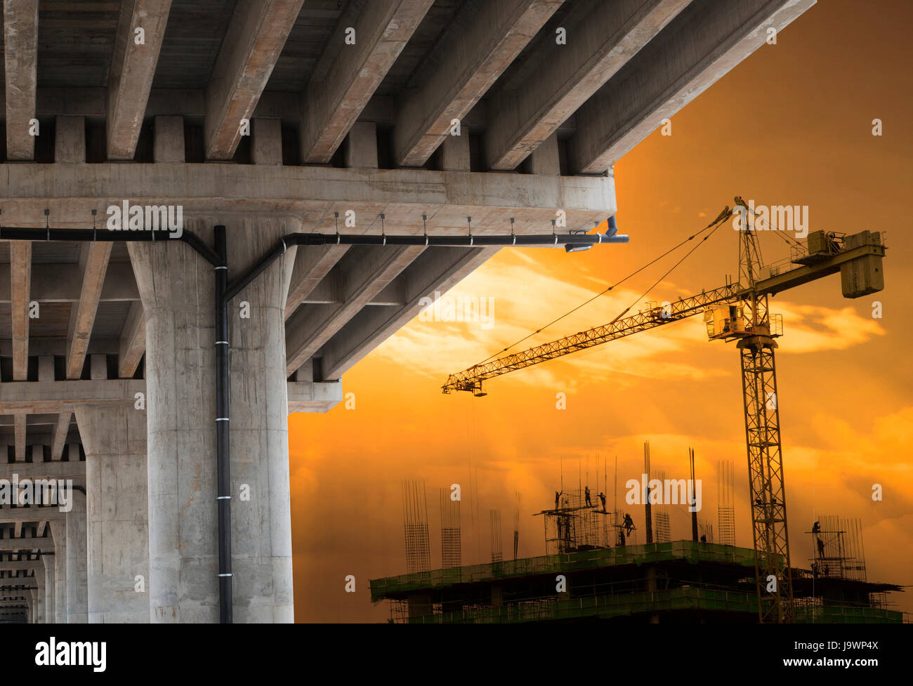urban development by big crane building construction with beautiful sky ...