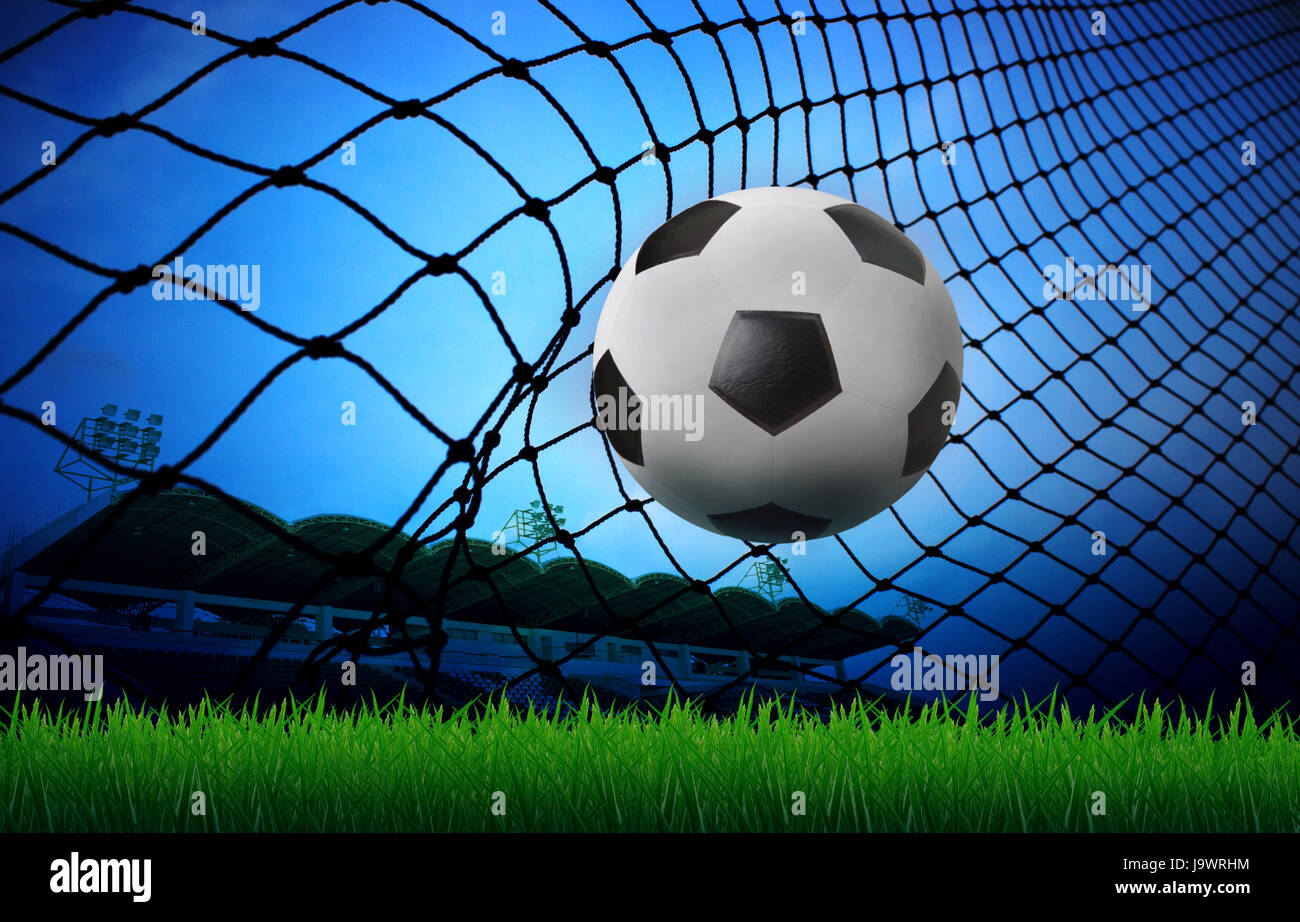 soceer football in goal net stadium Stock Photo - Alamy