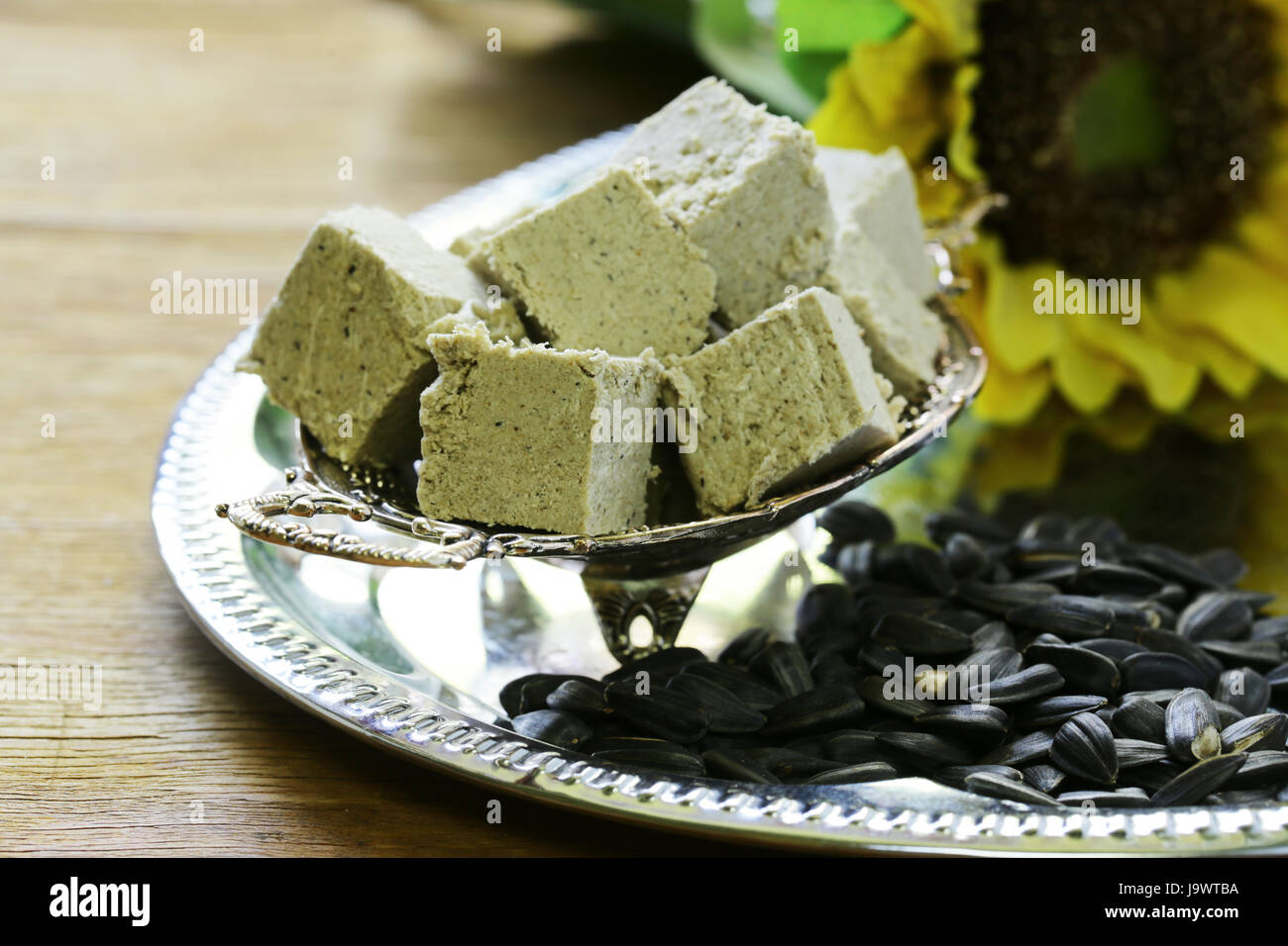 Oriental sweets halva from sunflower seeds with honey Stock Photo - Alamy