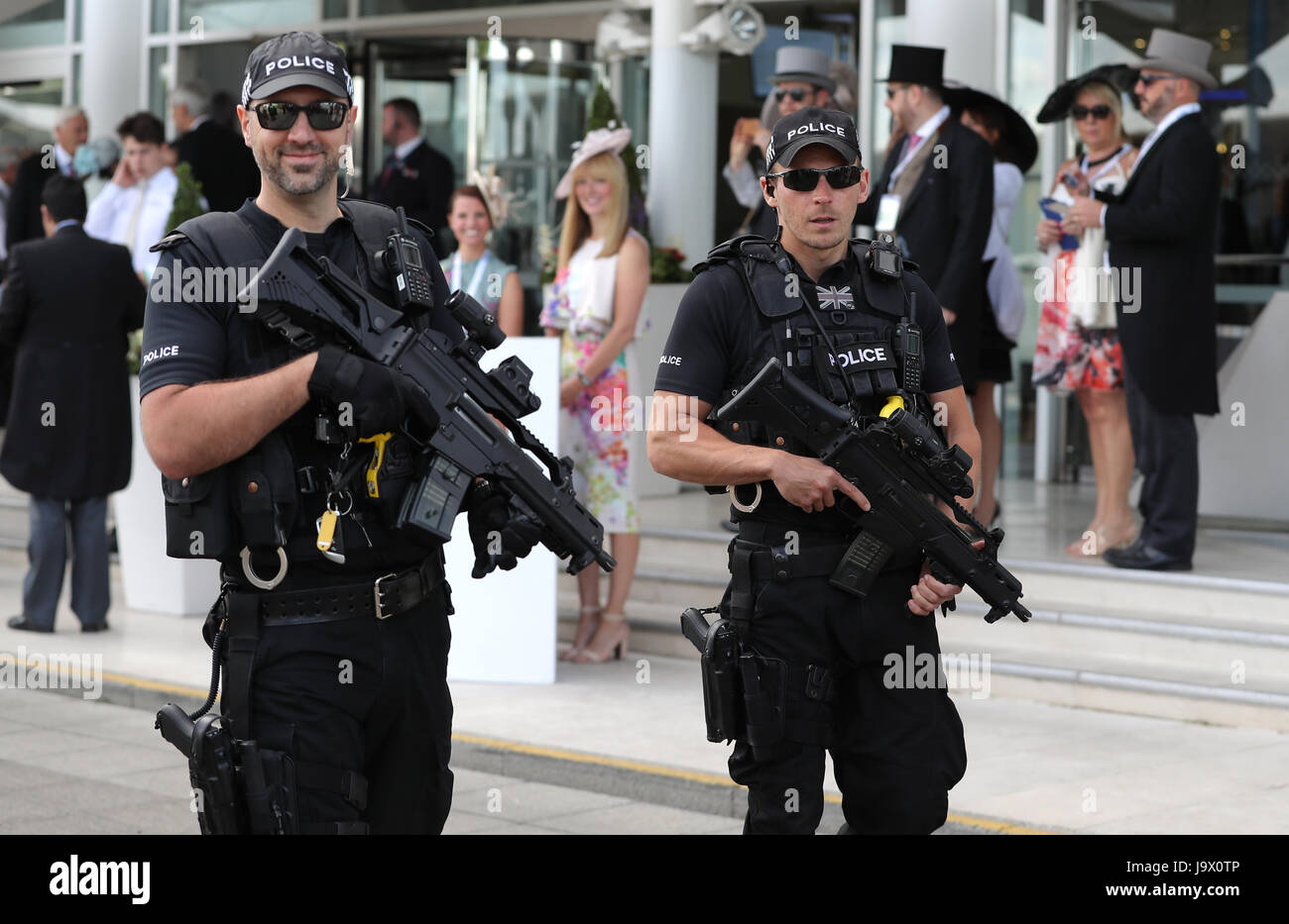 Armed police on patrol on Derby Day of the 2017 Investec Epsom Derby ...